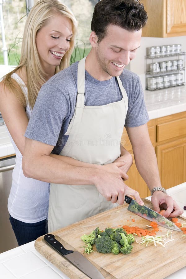 Couple cooking stock photo. Image of couple, hugging, carefree - 9232264