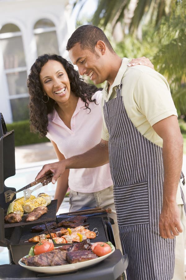 Group of Men Cooking on Barbeque at Home Stock Image - Image of food ...