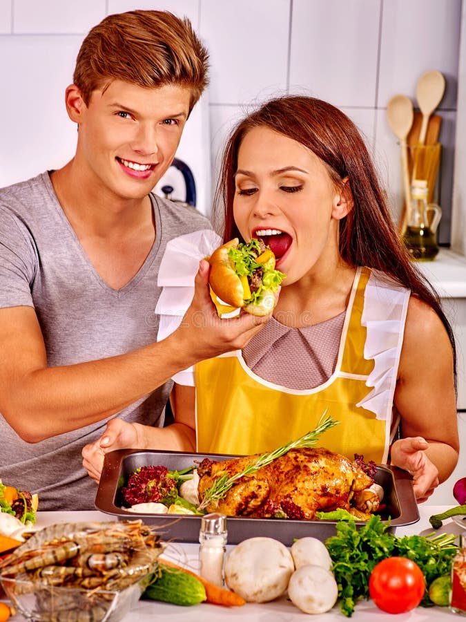 Couple Cooking Chicken at Kitchen Stock Photo - Image of lunch, happy ...