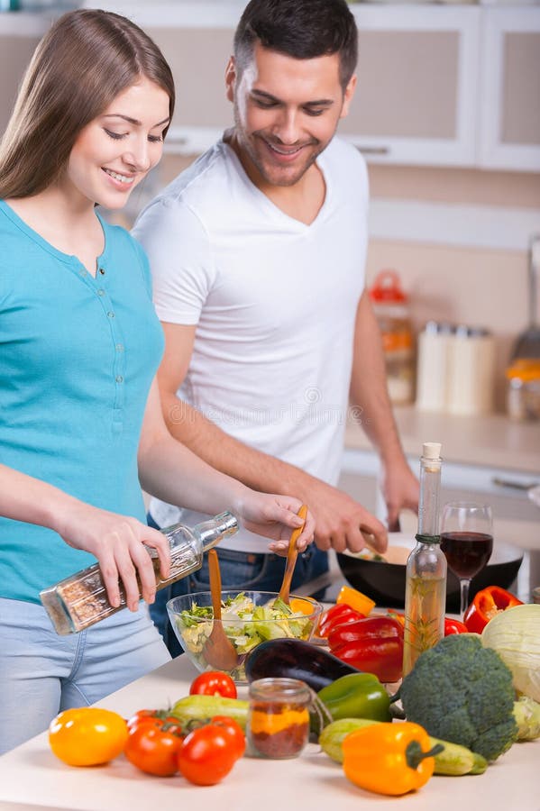 Couple Cooking Together in Kitchen Stock Image - Image of home, evening ...