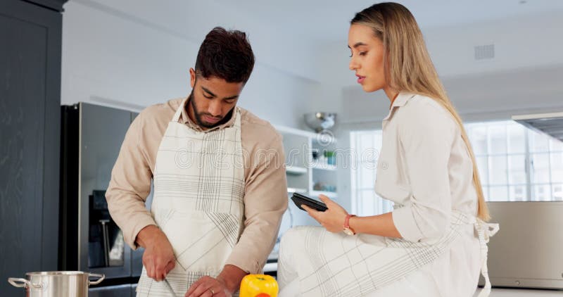 Couple, Cooking and Reading on Tablet for Online Recipe, Tutorial or ...