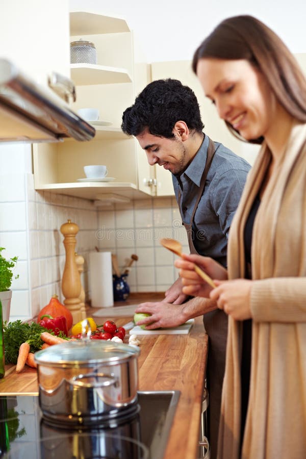 Couple Cooking Together in Kitchen Stock Image - Image of couple ...