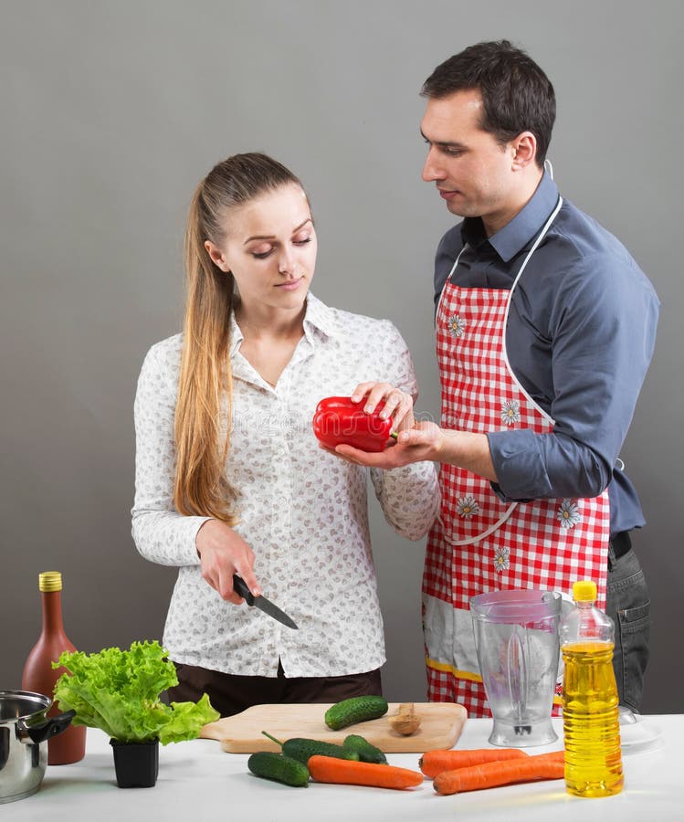 A couple cooks stock image. Image of date, fresh, apron - 55842731