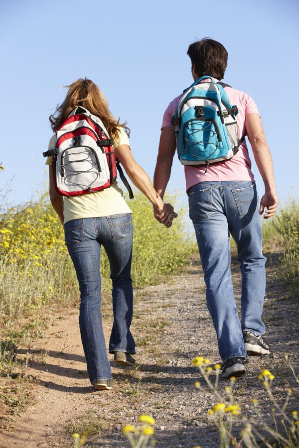 Couple on country walk stock image. Image of outdoors - 54960253