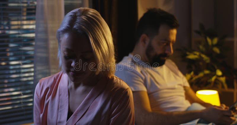 Couple Crying in Bed at Night Stock Photo - Image of negative, family ...