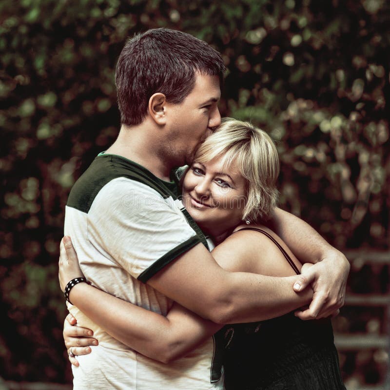 Couple Cuddling and Hugging Outdoors, Cute Couple in Love Stock Photo ...