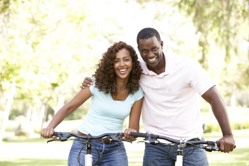 Couple on Cycle Ride in Park Stock Image - Image of ride, aged: 12404821