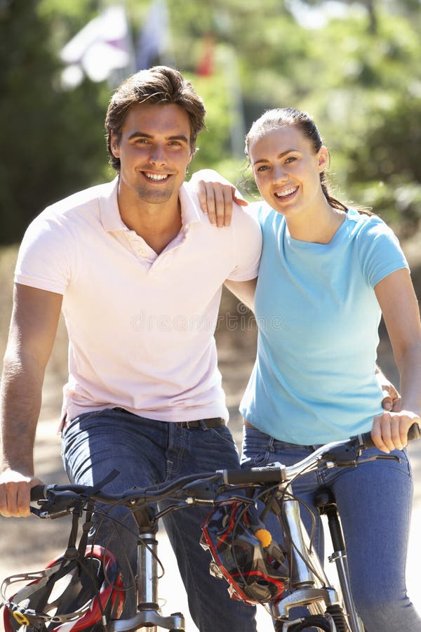 Couple on Cycle Ride in Park Stock Image - Image of ride, aged: 12404821