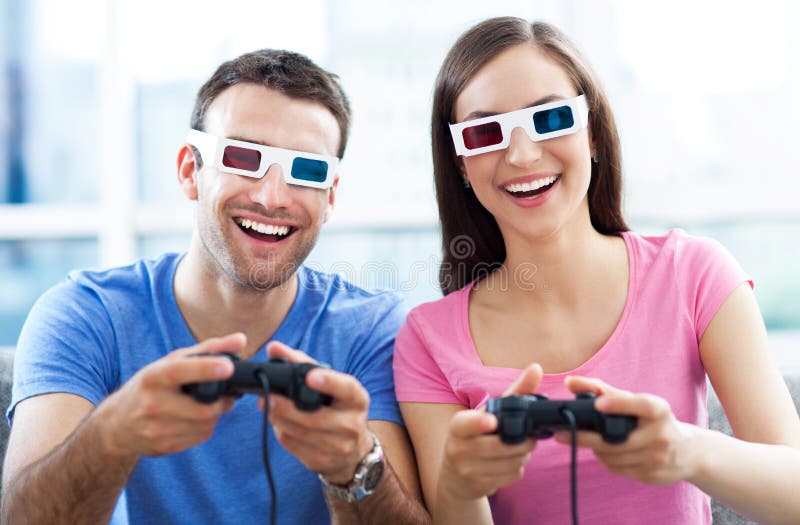 Couple in 3d glasses stock photo. Image of console, gamepad - 31606248
