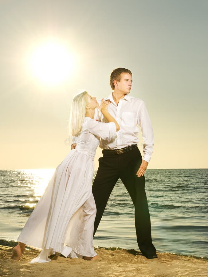 Couple dancing on a beach stock photo. Image of passion - 6765898