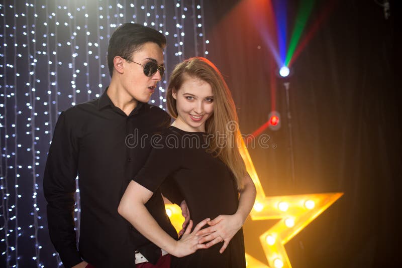 Couple of Dancing People at a Disco Stock Image - Image of group ...