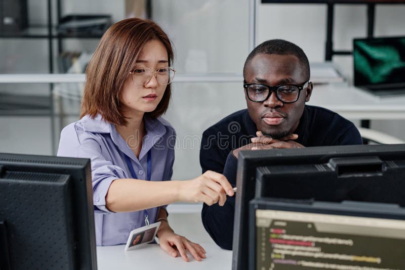 Couple of Developers Working on Computer Together Stock Image - Image ...