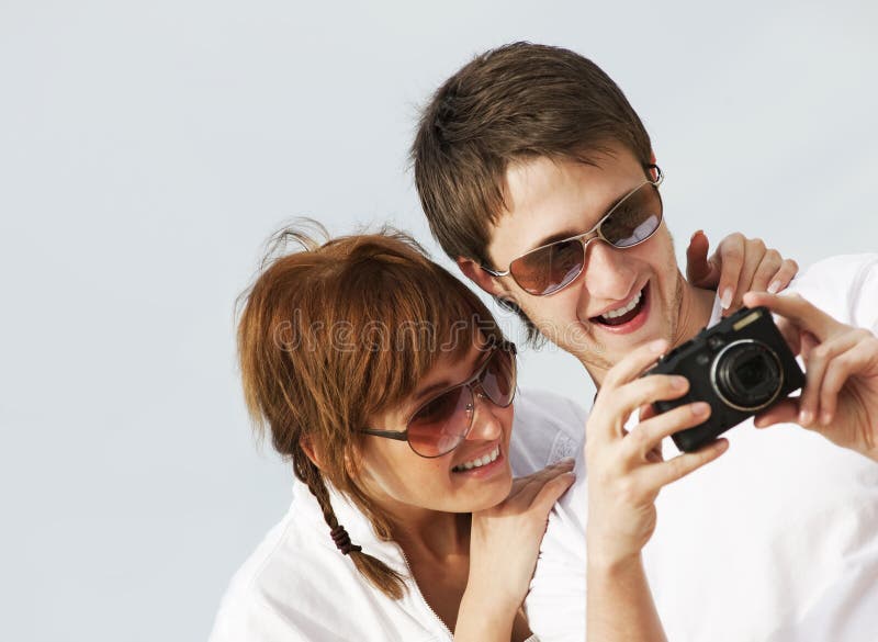 Girl with a digital camera stock photo. Image of pointing - 3307044