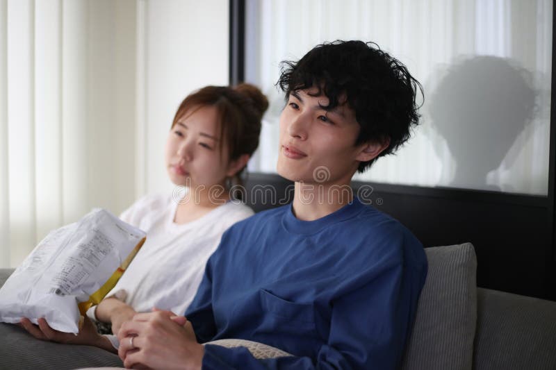 A Couple is Disappointed by the Loss of the Team they Support Stock ...