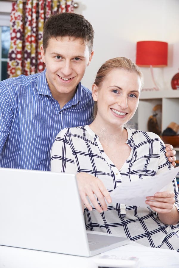 Couple Discussing Big Purchase Stock Image - Image of couple, table ...