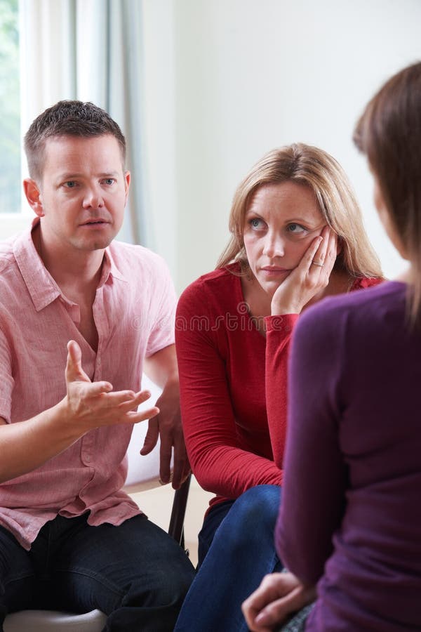 Couple Discussing Problems with Relationship Counsellor Stock Image ...