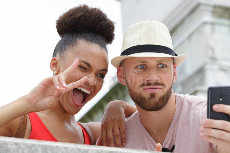 Couple Doing Funny City Break Selfie Stock Image - Image of casual ...