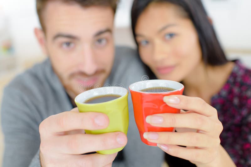 Couple drinking coffee stock photo. Image of smiling - 286470890