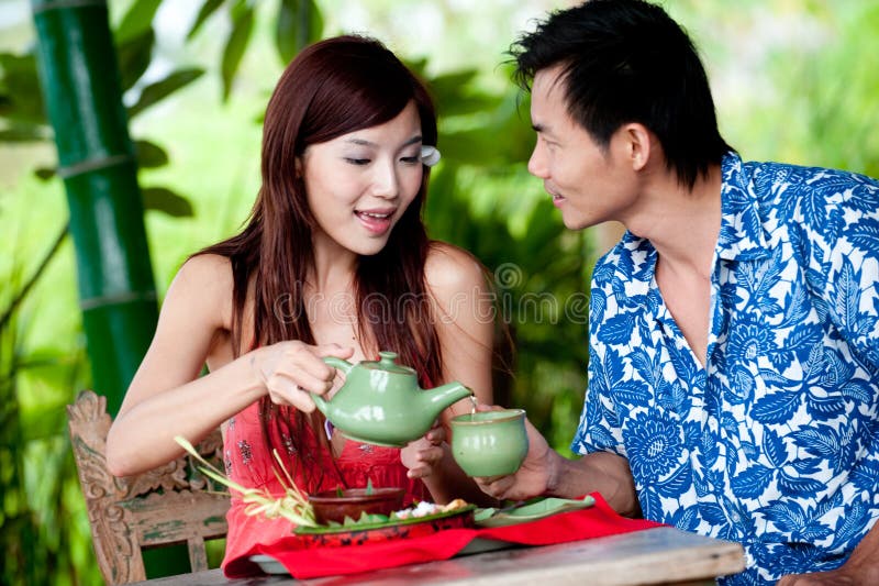 Couple Drinking Tea stock image. Image of good, tropical - 9244549