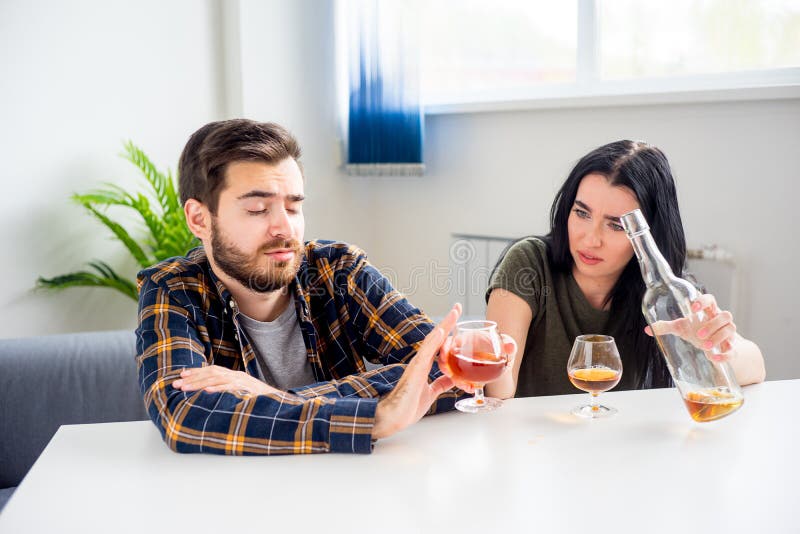 Couple drinking together stock photo. Image of expensive - 99889942