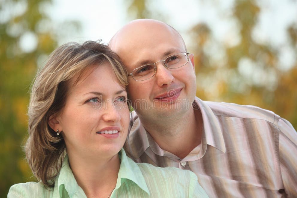 Couple in Early Fall Park. they are Cuddling Stock Image - Image of ...