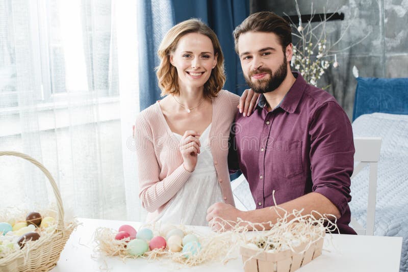Couple with easter eggs stock photo. Image of couple - 90488416