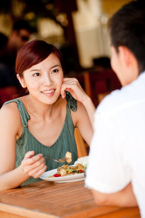 Couple Eating stock photo. Image of lifestyle, male, woman - 9660924