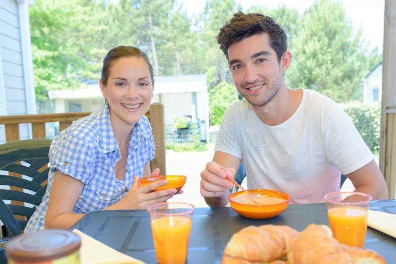 Couple Eating Breakfast Outdoors Stock Image - Image of croissant ...