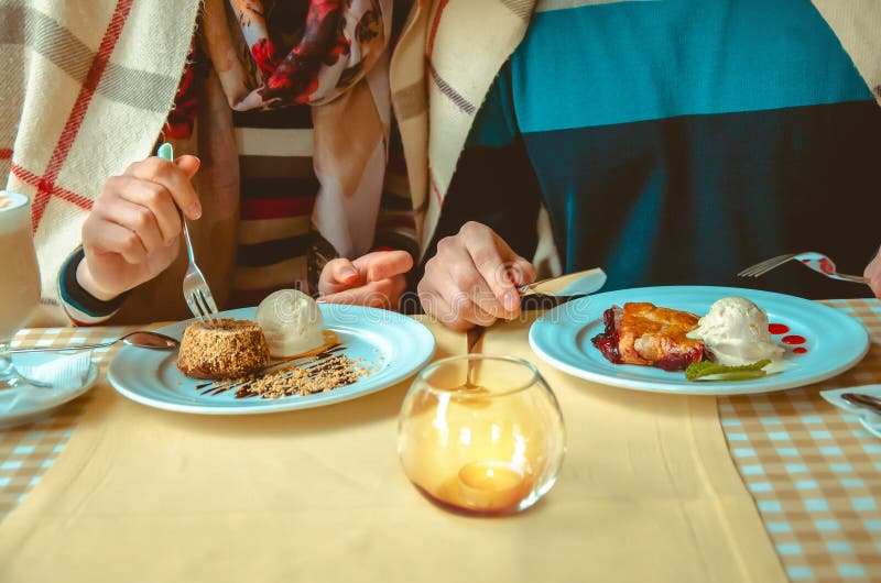 Couple Eating Dessert in a Restaurant Stock Photo - Image of cheerful ...