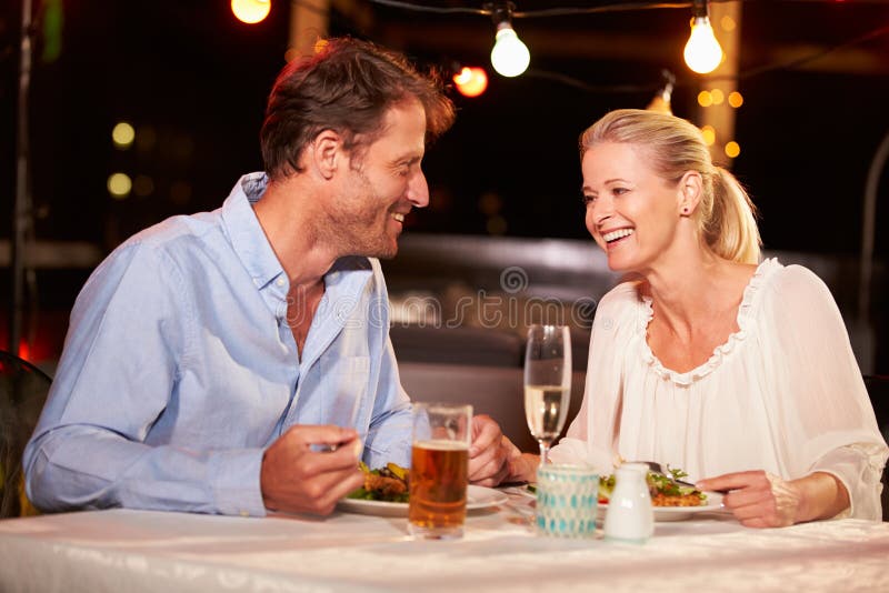 Couple Eating Dinner at Rooftop Restuarant Stock Photo - Image of ...