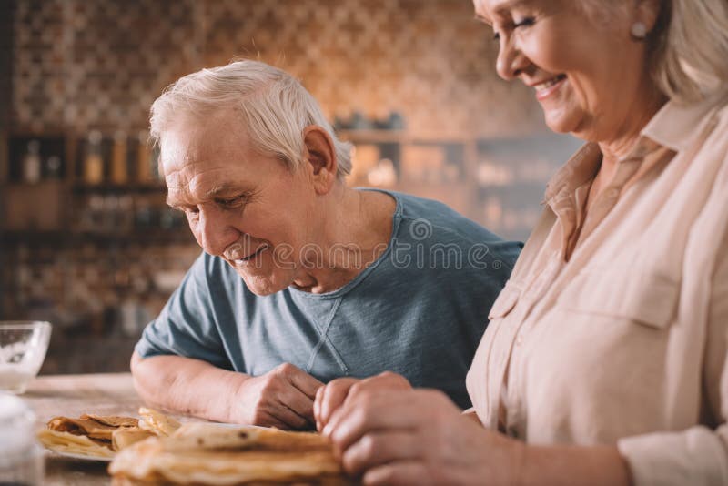 Couple Eating Pancakes on Kitchen at Home Stock Image - Image of woman ...