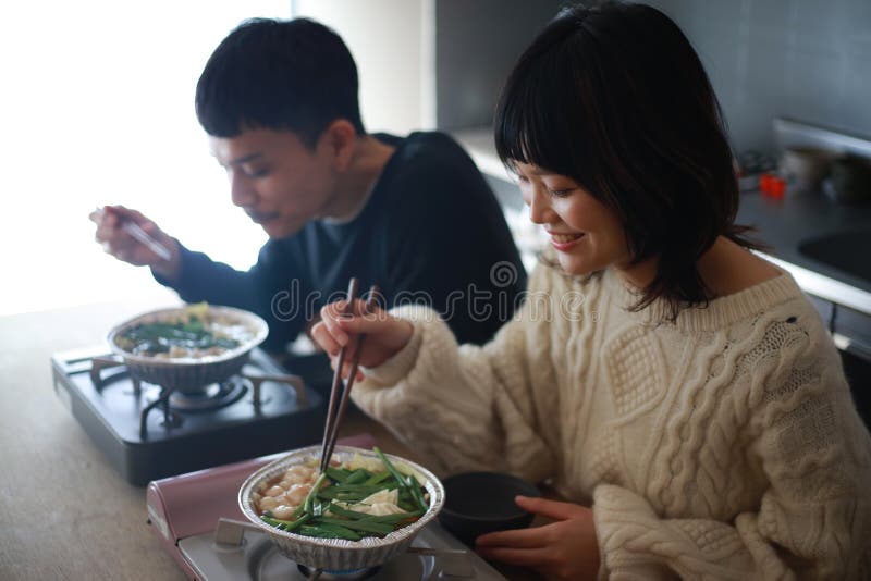 Couple eating a pot stock image. Image of family, smile - 241906583