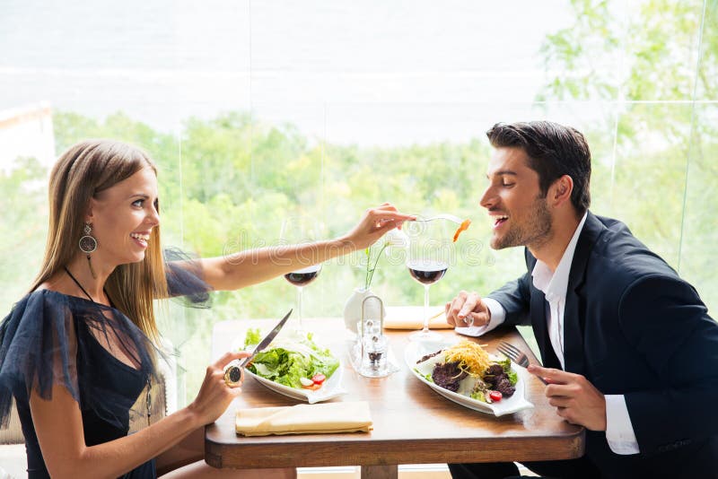 Couple Eating in Restaurant Stock Photo - Image of date, glamour: 58462530