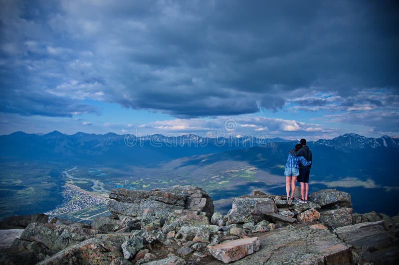 Couple on the Edge of the Cliff Stock Photo - Image of romance ...