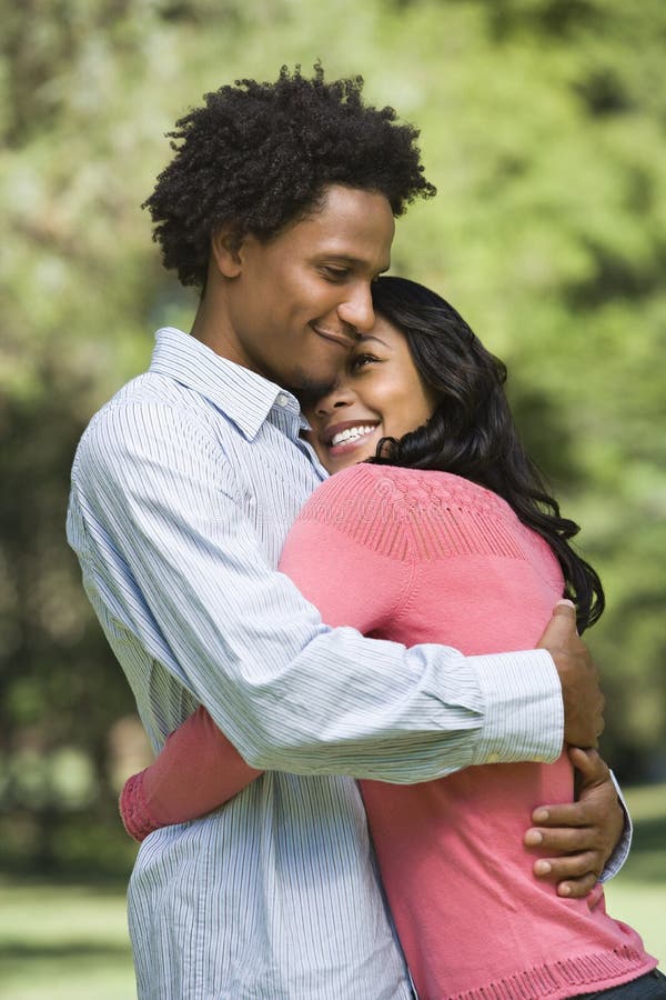 Couple embracing. stock image. Image of affectionate, maui - 2423517
