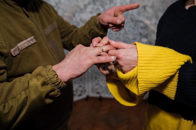 A Couple Engaging in a Touching Moment during a Proposal Stock Photo ...
