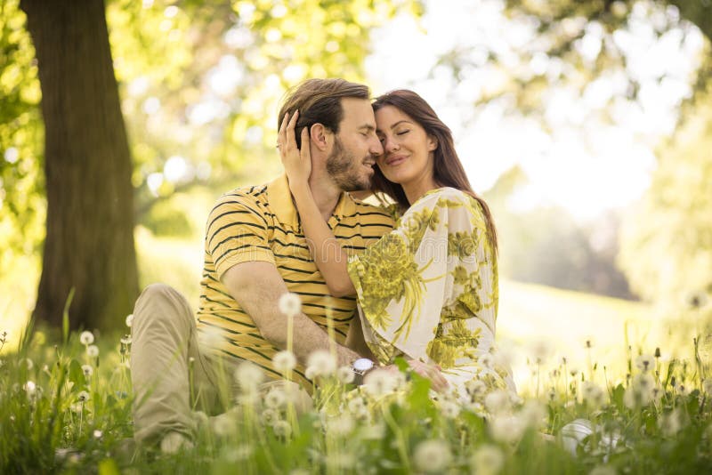 Couple enjoy in nature. stock photo. Image of girls - 121364996