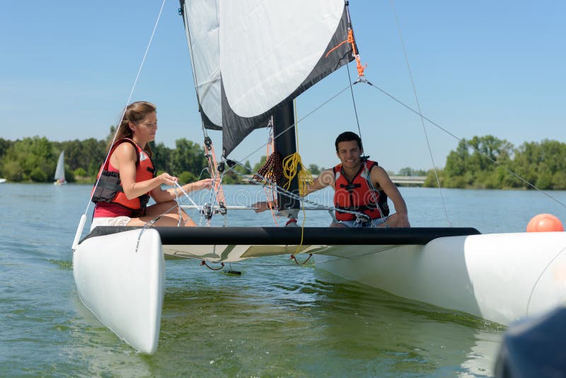 Couple enjoying boat ride stock photo. Image of good - 229443568