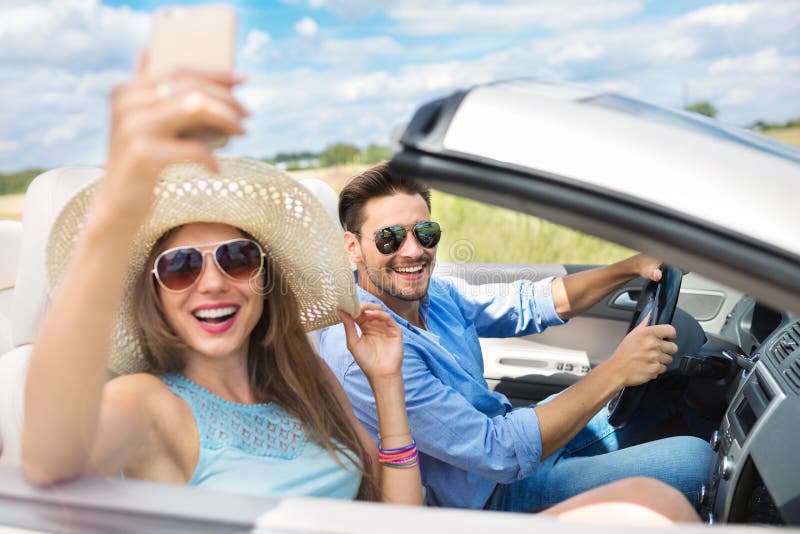 Couple Enjoying a Drive in a Convertible Stock Photo - Image of toothy ...
