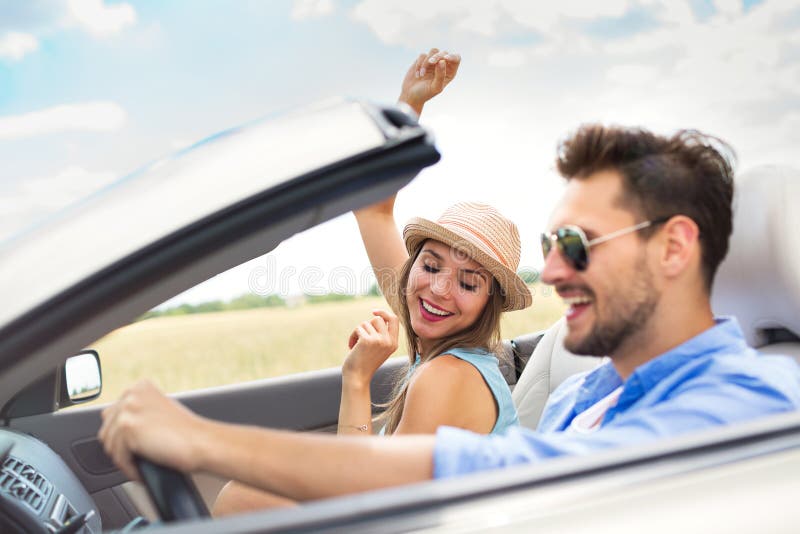 Couple Enjoying a Drive in a Convertible Stock Photo - Image of ...