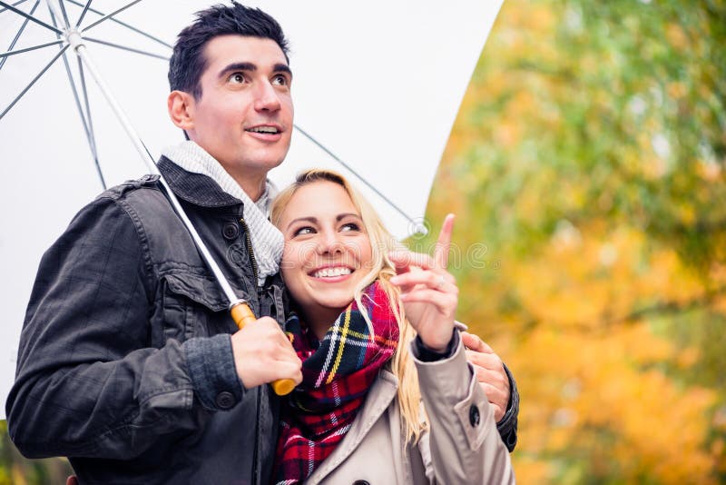 Couple Enjoying Fall Day Having Walk Despite the Rain Stock Photo ...