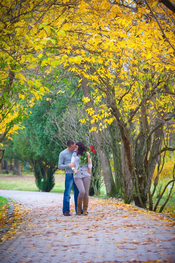 Couple Enjoying Golden Autumn Fall Season Stock Photo - Image of park ...