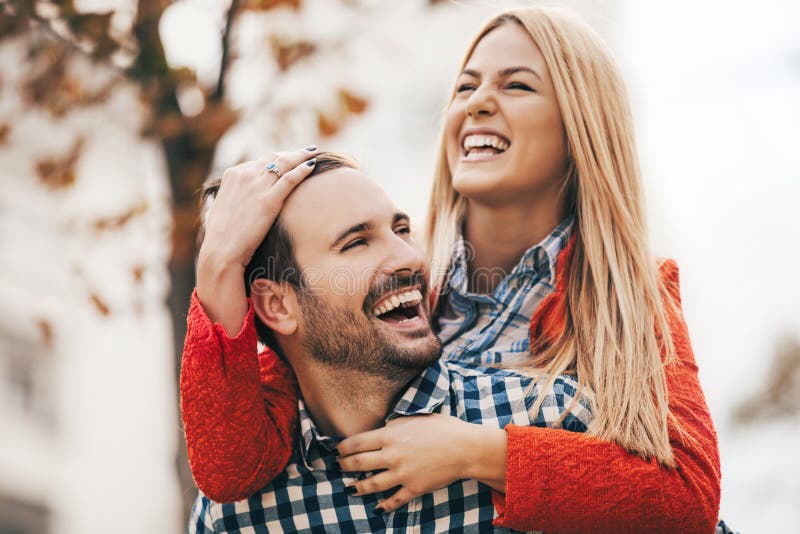 Couple enjoying outside stock photo. Image of friends - 78735830
