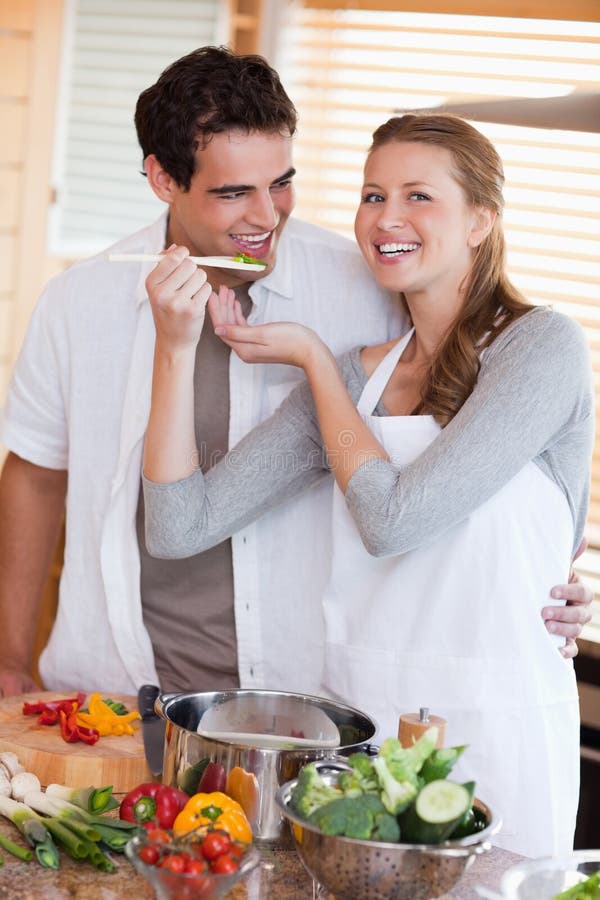 Couple Enjoys Preparing Dinner Together Stock Image - Image of chef ...