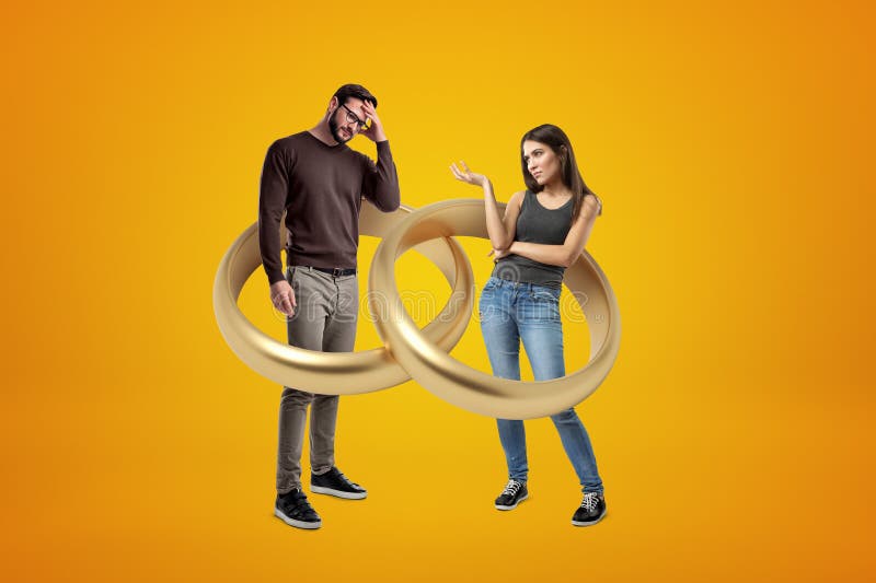 Couple in an Entangled Gold Ring Illusion Stock Image - Image of ...