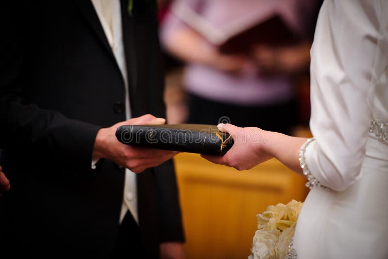A couple exchange vows stock photo. Image of embrace - 19929248