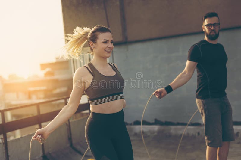 Couple jumping ropes stock photo. Image of girl, lose - 117455560