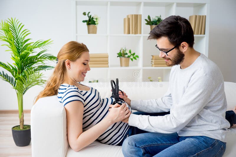 Couple expecting a baby stock photo. Image of happy, male - 97475296