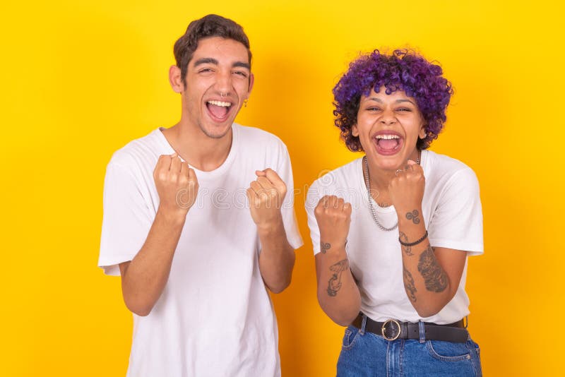 Couple with Expression of Success Stock Photo - Image of fist ...