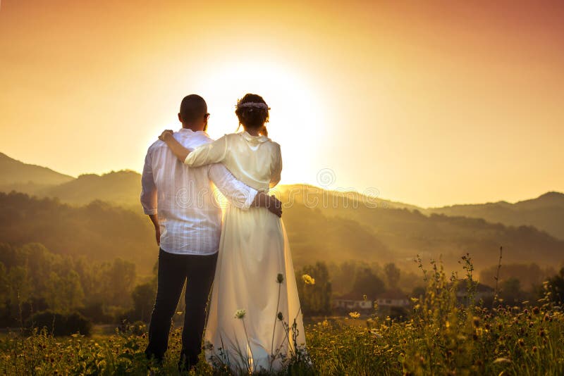 Couple Facing Sky Together Looking At The Sun Stock Image - Image of ...